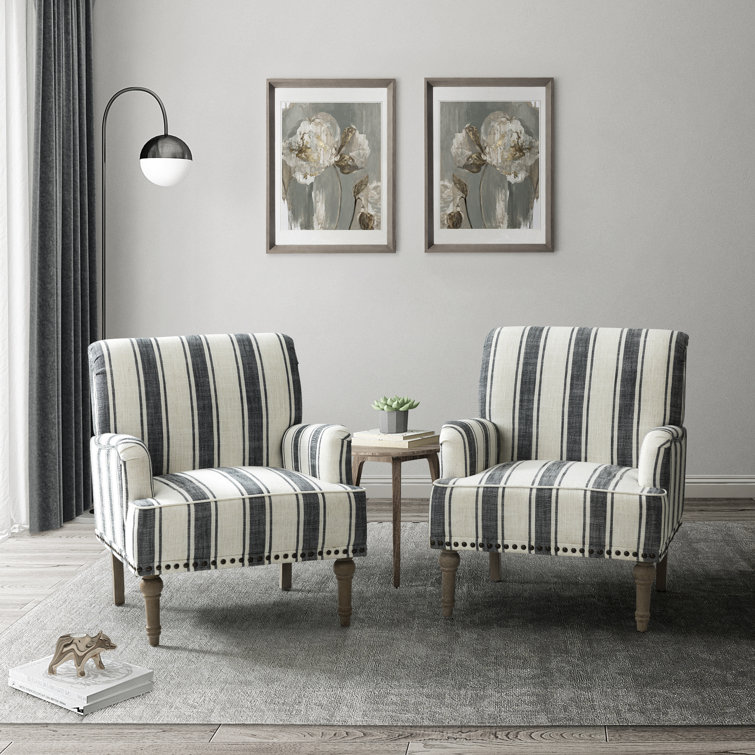 Arching Armchair With Solid Wood Turned Legs and Nailhead Trim